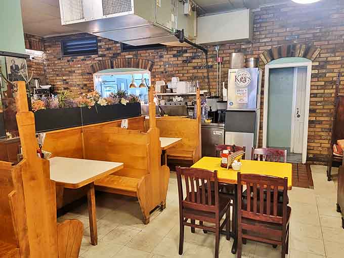 Wooden booths and brick walls create the perfect backdrop for conversations that flow as freely as the coffee refills.