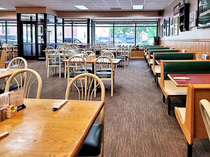 The dining area strikes that perfect balance between cozy and spacious, with wooden tables inviting you to linger over coffee and conversation.