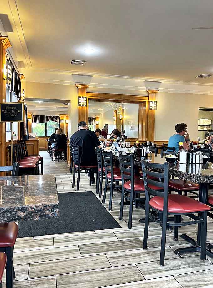 Inside, warm wood tones and comfortable seating create the perfect backdrop for serious breakfast business and leisurely weekend brunches alike.