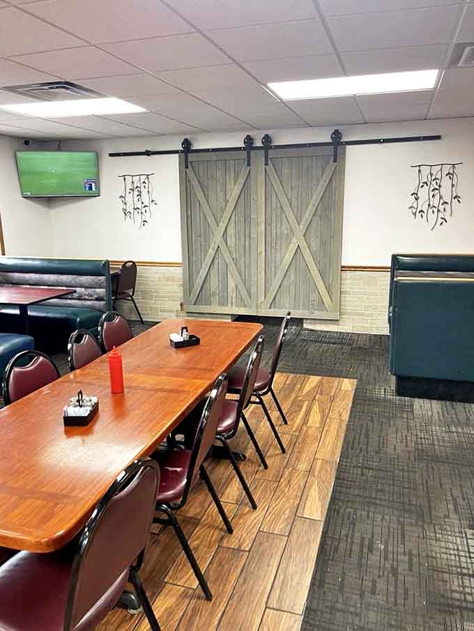 Inside, rustic barn doors and cozy seating create the perfect atmosphere for a leisurely breakfast that feels like home.