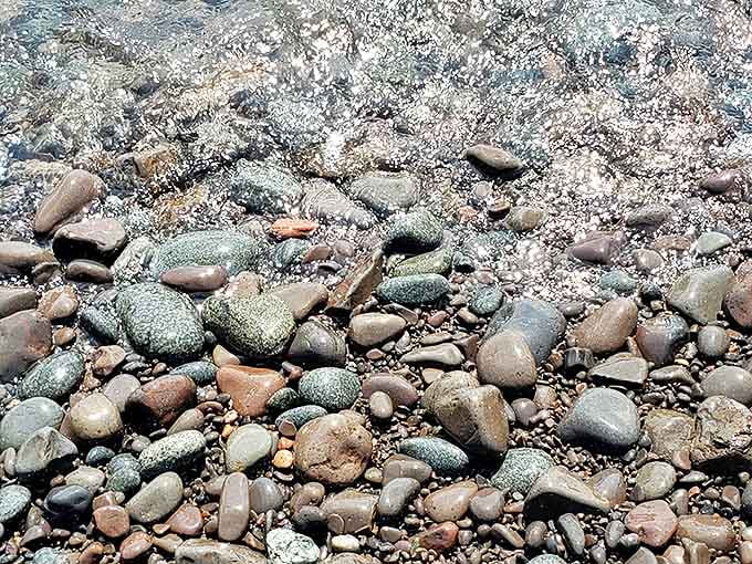 A kaleidoscope of perfectly polished stones, each telling a geological story millions of years in the making.