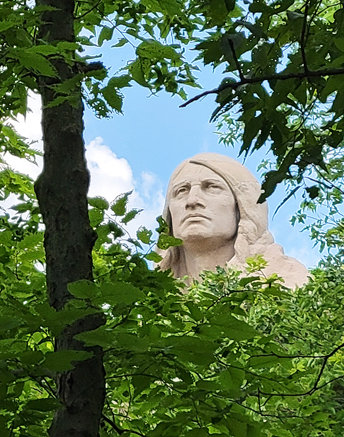 Up close, the statue's face reveals remarkable detail and expression &ndash; like a stern grandparent who's seen it all but still loves you anyway.