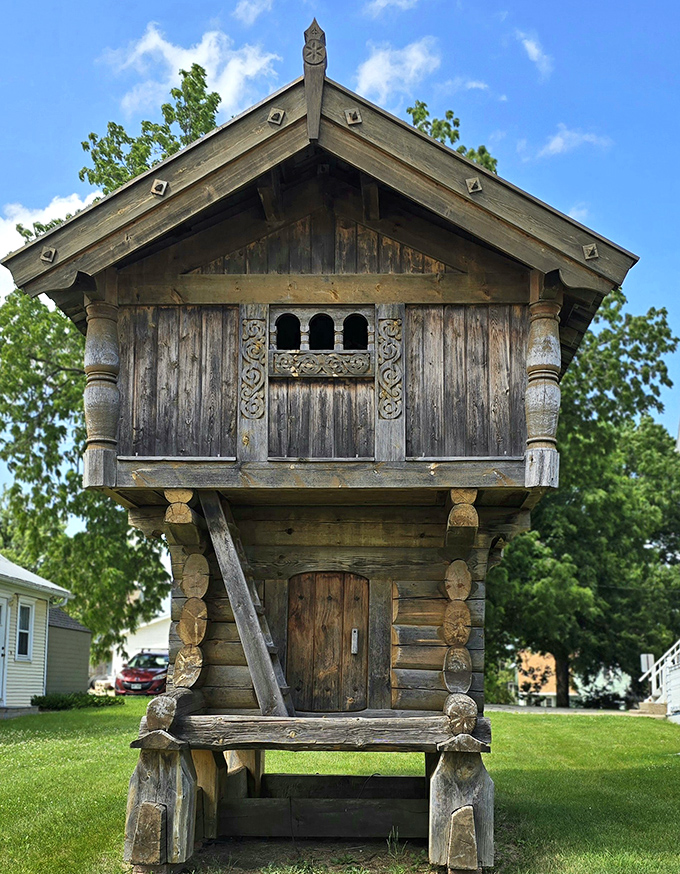 This traditional Norwegian-style storehouse stands as a testament to authentic heritage, looking like it was plucked straight from a fjord-side village.