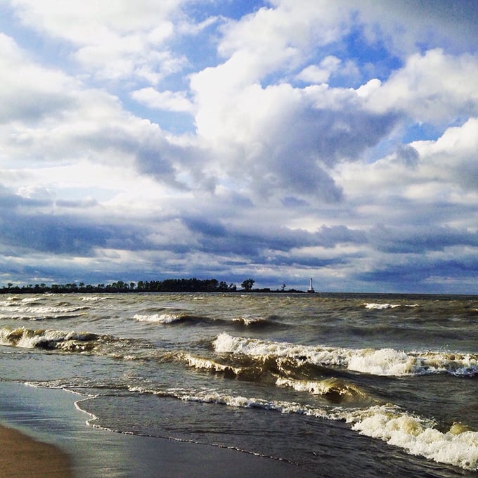 Gentle waves lap against the shore under a sky dotted with cotton candy clouds &ndash; nature's perfect stress reliever.