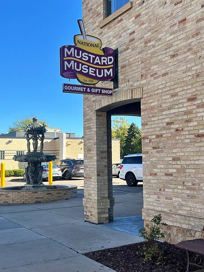 The National Mustard Museum's colorful sign promises a tangy adventure. That fountain in front probably isn't flowing with mustard, but wouldn't that be something?