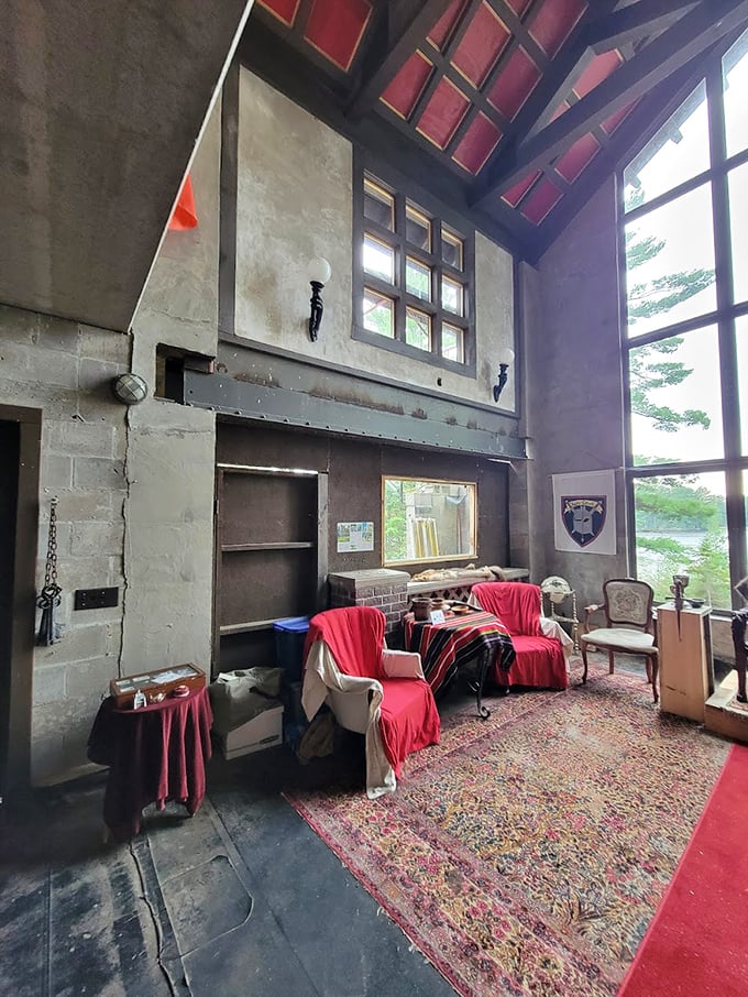 The castle's great room blends medieval stone with cozy comforts &ndash; high ceilings and large windows create a space that's both grand and inviting.