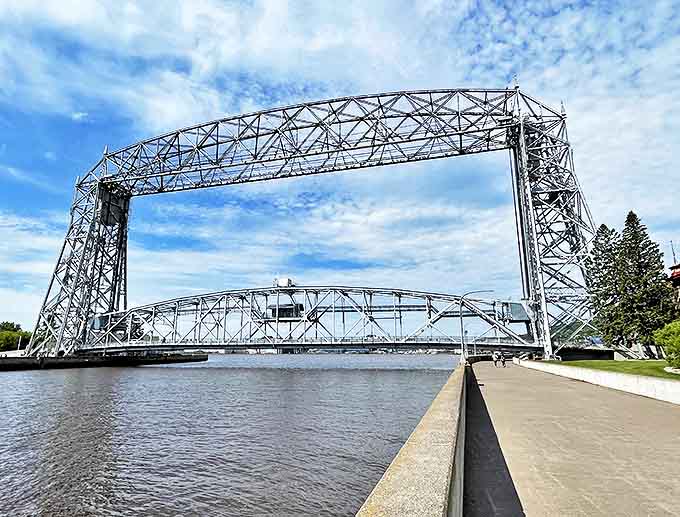 Duluth's Aerial Lift Bridge performs its mechanical ballet, rising majestically to let ships pass beneath its 386-foot span.