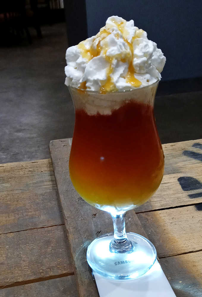 Their famous Butterbeer comes topped with a cloud of whipped cream and caramel drizzle&mdash;Harry Potter would abandon Hogsmeade for this magical concoction.