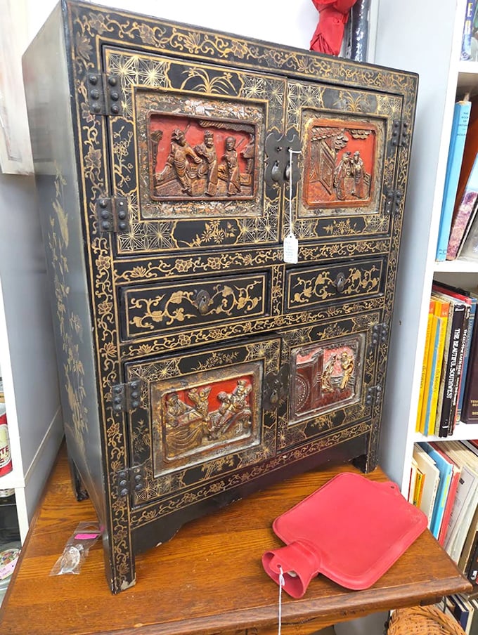 This ornate Asian cabinet tells stories of distant lands and craftsmanship rarely seen in today's mass-produced furniture world.