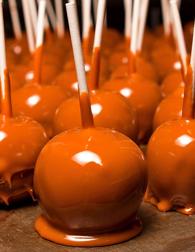 These aren't just caramel apples &ndash; they're edible architecture, each one a perfect balance of tart fruit and buttery caramel.