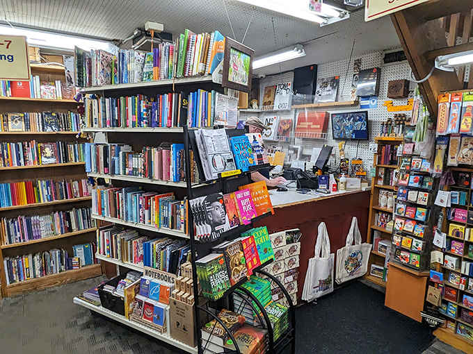 Narrow passages force browsers to slow down and savor the journey, creating intimate moments between readers and the treasures they discover.