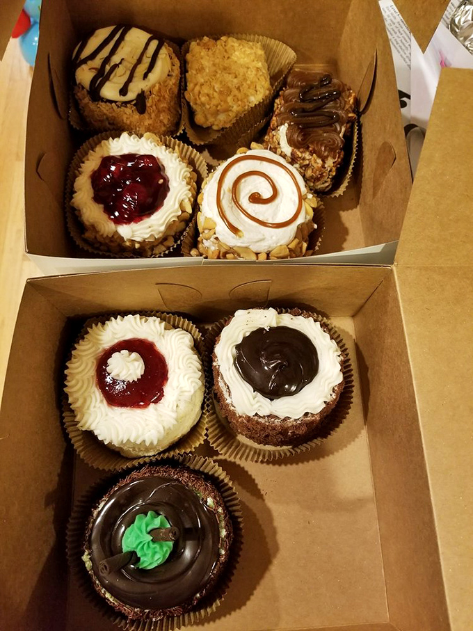 A box of heaven! These assorted cupcakes showcase the artistry behind Vande Walle's creations, each one a miniature masterpiece of flavor.