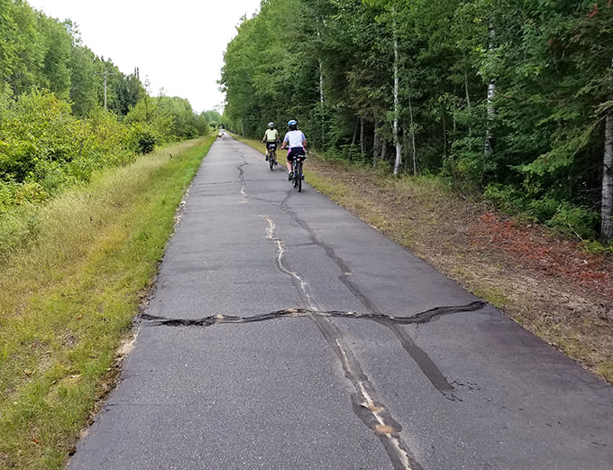 Even the occasional crack in the pavement can't diminish the joy of cycling through Minnesota's Iron Range, where every mile offers a new perspective.