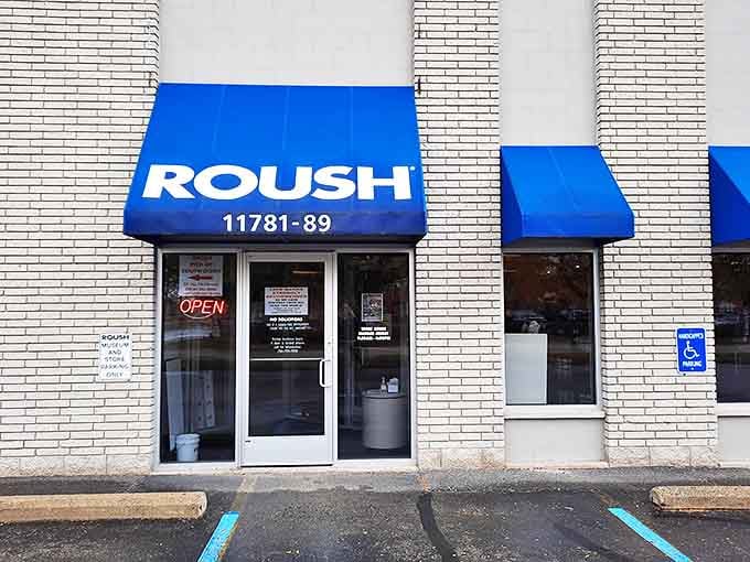 Those royal blue awnings mark the gateway to car heaven&mdash;where even the most casual visitor becomes a temporary gearhead.