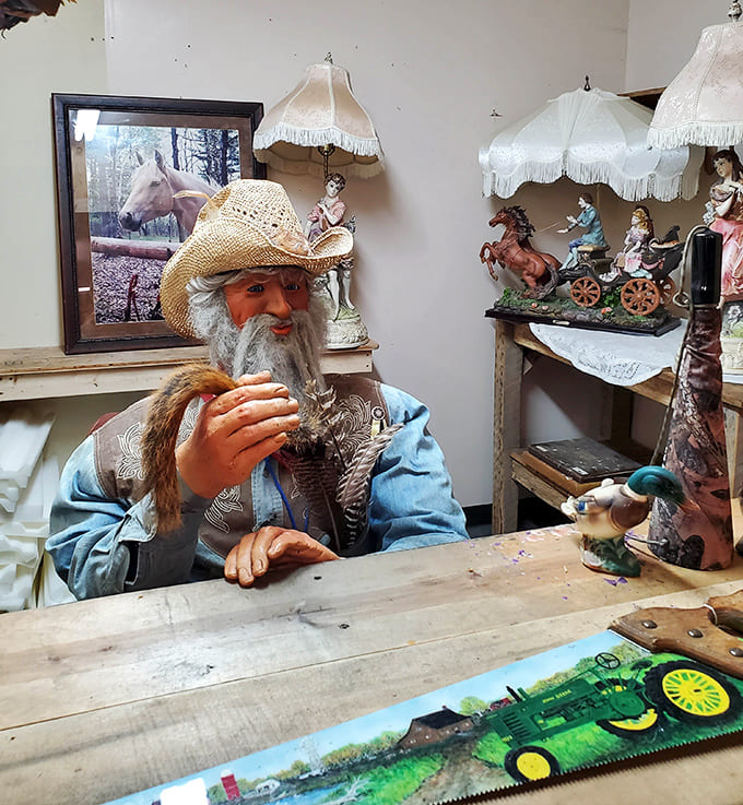 That mannequin in the cowboy hat guards treasures like a Wild West shopkeeper from another era.