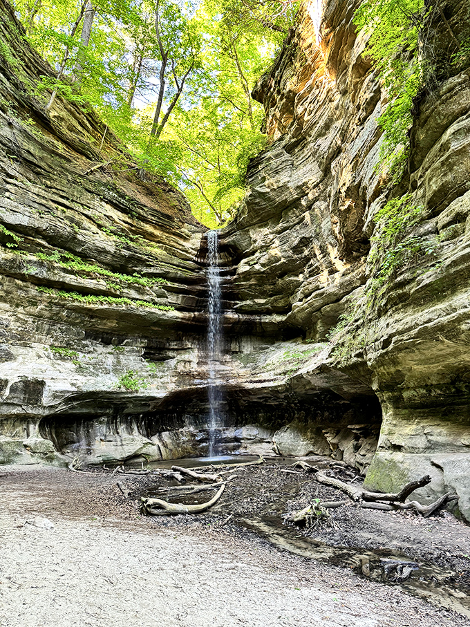 A hidden cascade tucked between verdant walls feels like stumbling upon a secret room in Mother Nature's mansion.
