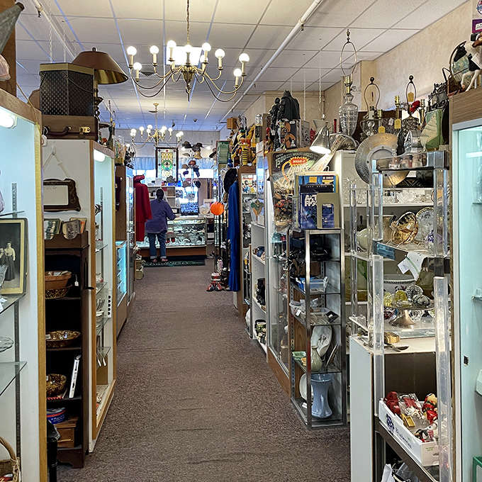 Narrow pathways lead to endless discoveries as display cases and shelves create a mesmerizing maze of memories and merchandise.