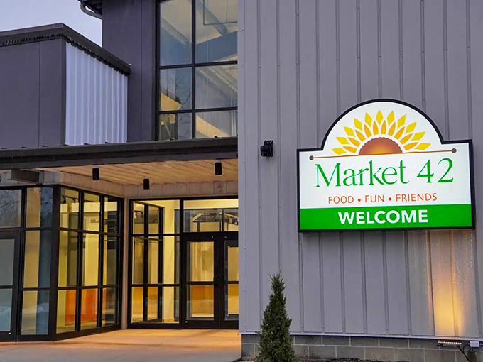 Market 42 welcomes food lovers with its bright, modern facade – a community hub where "Food, Fun, Friends" isn't just a slogan but a promise.