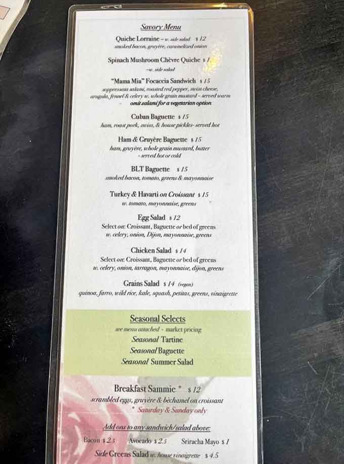 The savory menu reads like a love letter to lunch, featuring quiches, baguette sandwiches, and salads that elevate midday meals to memorable occasions.