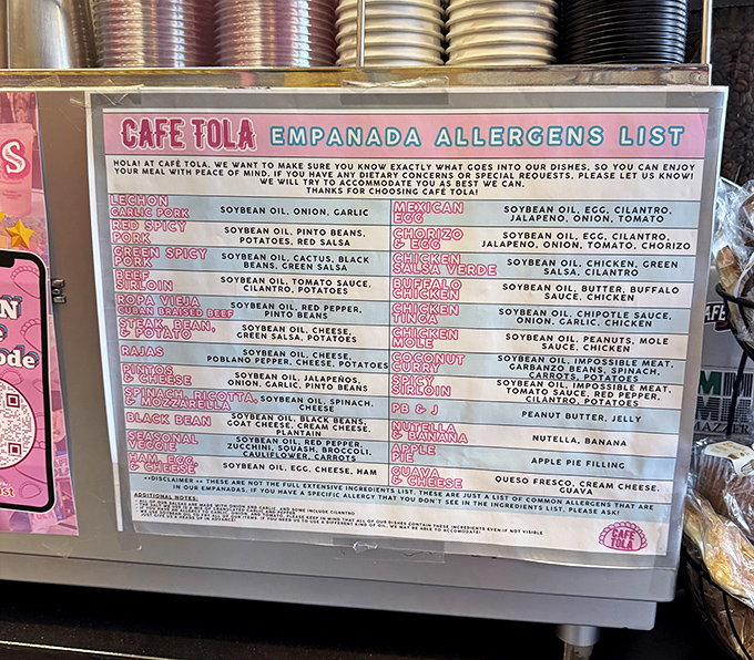 The empanada menu reads like a love letter to flavor &ndash; from traditional beef to innovative vegan options, all clearly marked for allergen concerns.