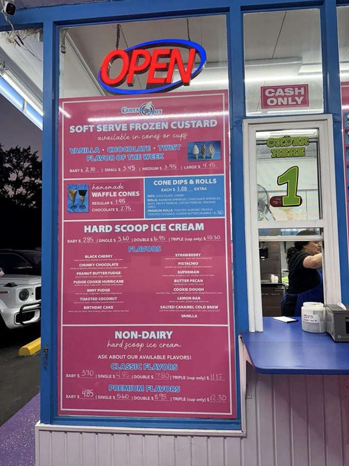 The pink menu board &ndash; a roadmap to happiness listing every creamy possibility from classic vanilla to exotic flavor adventures.