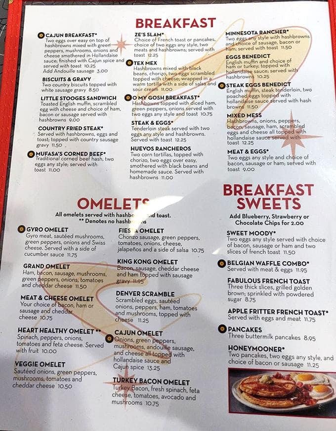 The menu reads like a love letter to breakfast enthusiasts, with creative options from "Cajun Breakfast" to "O My Gosh" platters.