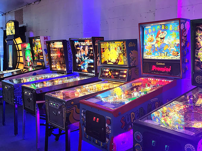 The hypnotic glow of pinball machines stands ready to challenge your flipper skills and transport you back to arcade glory days.