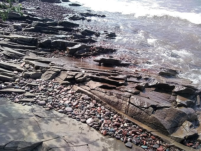 Ancient rock formations tell geological stories older than civilization itself, layered like pages in Earth's own autobiography.