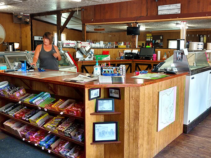 Service Counter: Command central where sandwiches are crafted with care and local news is exchanged with more reliability than any weather app.