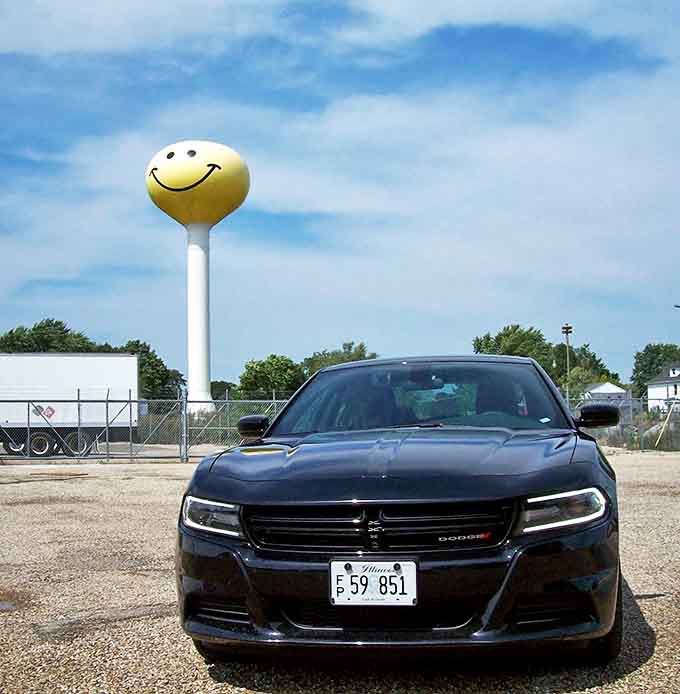 Even your car seems happier when parked beneath this towering beacon of positivity &ndash; road trip therapy at its finest.