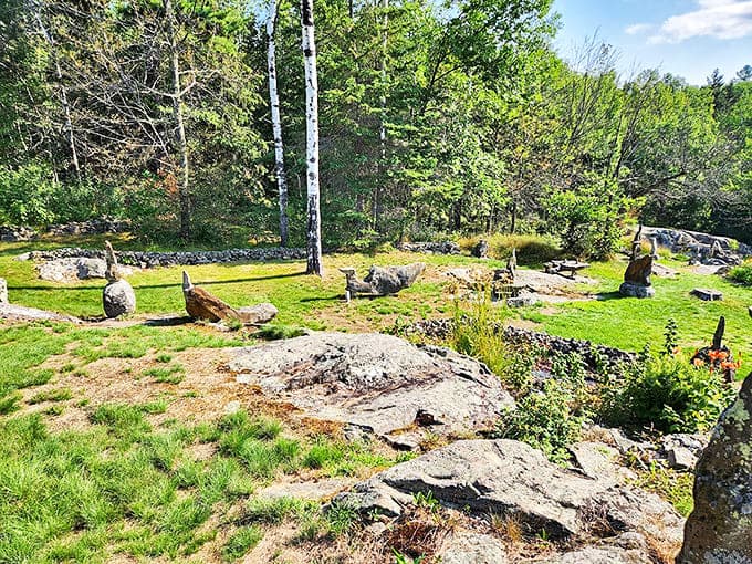 Stone sculptures emerge from the landscape like geological poetry, their careful placement creating a conversation between human design and natural wilderness.