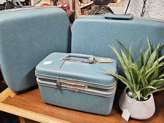 These aqua vintage suitcases aren't just luggage; they're portable time capsules ready to carry your imagination to glamorous bygone eras.