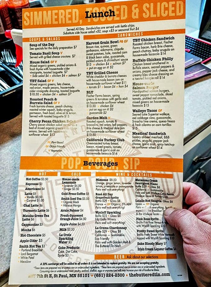 The lunch menu reads like a love letter to comfort food, featuring creative sandwiches and hearty bowls that elevate casual dining to an art form.