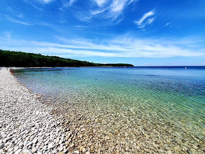 Nature's mosaic: Thousands of smooth limestone pebbles create a beach experience unlike any other in the world.