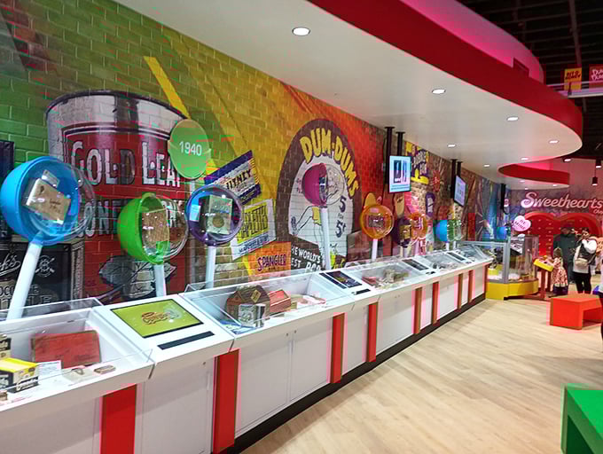 A historical mural celebrates Spangler's candy-making legacy, with vintage photographs and memorabilia telling the sweet story behind America's beloved lollipops.