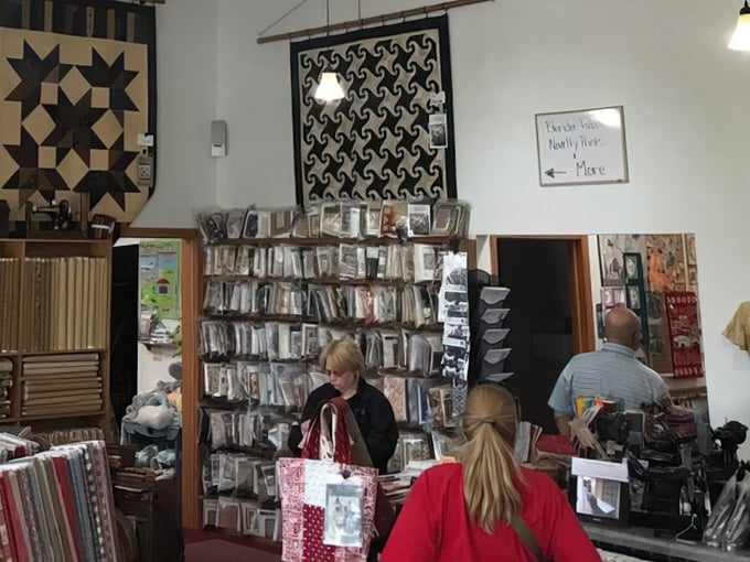 The meticulously organized fabric section features thousands of bolts in every imaginable color, pattern, and texture for your next masterpiece.