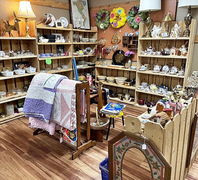 Shelves overflow with dishware and decorative pieces, proving that one person's dusty attic contents are another person's design inspiration dreams.