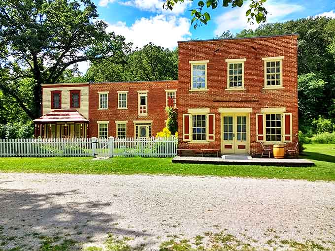 The Meighen Store's brick exterior and yellow-trimmed windows offer a warm welcome to visitors seeking authentic 19th-century charm.