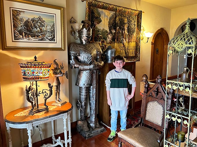 Knights in shining armor stand at attention in corridors adorned with tapestries, silently greeting visitors who step into this time-traveling treasure.