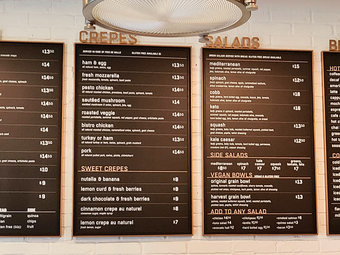 The menu board reads like a love letter to French caf&eacute; culture, with crepes both sweet and savory stealing the spotlight.