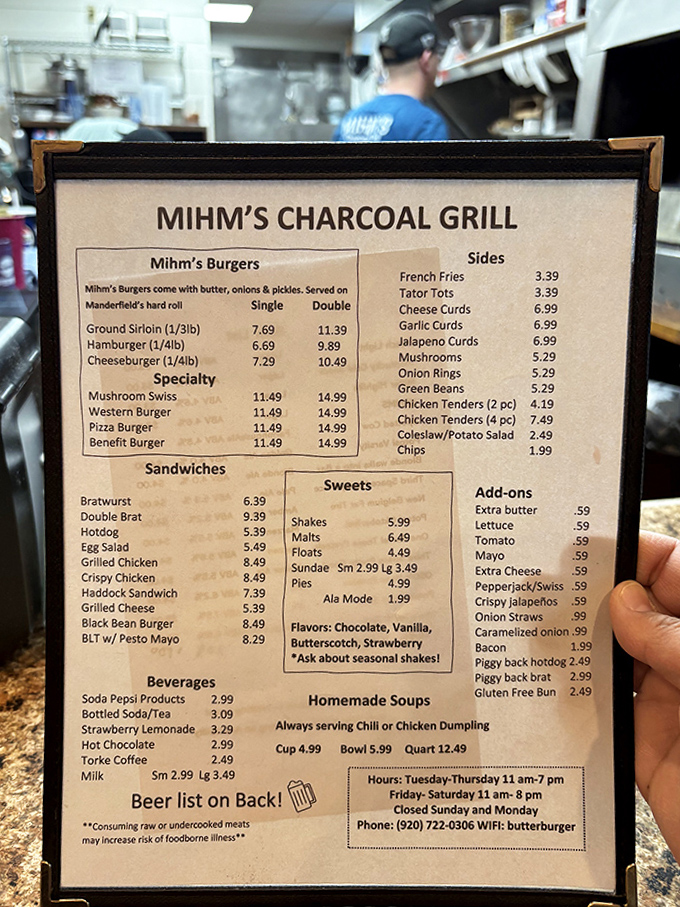 The menu board tells a story of simplicity and perfection. No fancy descriptions needed when your reputation spans generations.