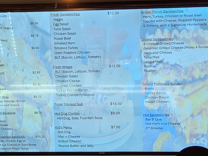 The menu board tempts with a parade of possibilities &ndash; from fresh sandwiches to sweet treats that make decision-making deliciously difficult.
