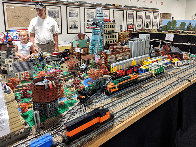 Visitors young and old marvel at the LEGO cityscape, where plastic bricks transform into recognizable Twin Cities landmarks.