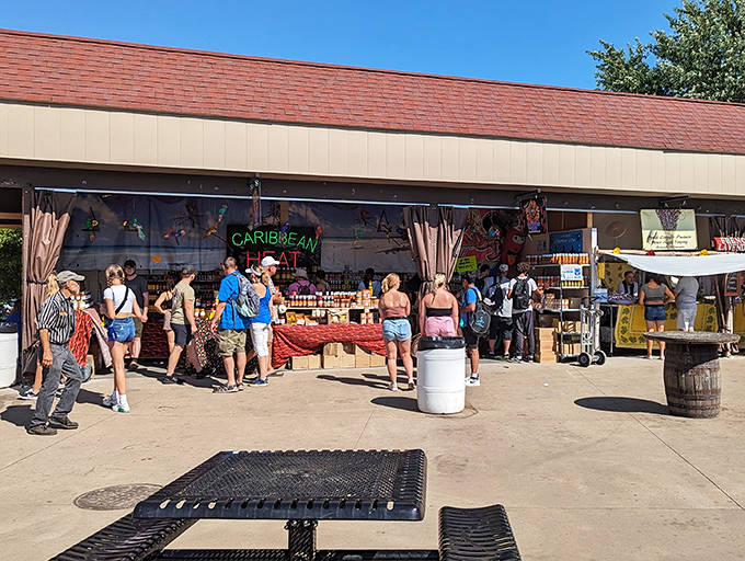 Shoppers browse the Caribbean Hut, where tropical flavors and vibrant colors transport visitors straight to island life without leaving Minnesota soil.