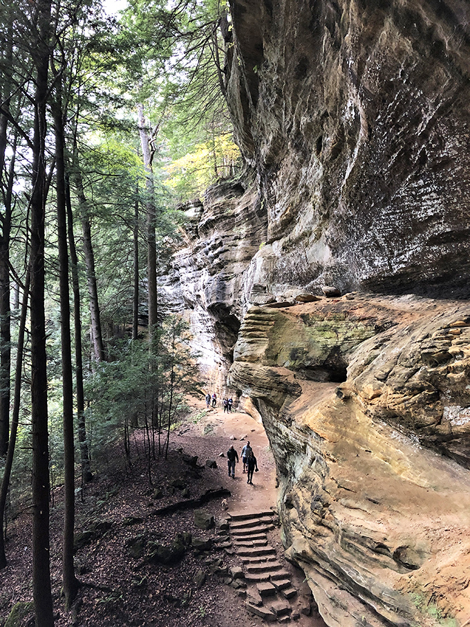 Ancient stone steps lead adventurers along cliff edges where each turn reveals another postcard-worthy vista.