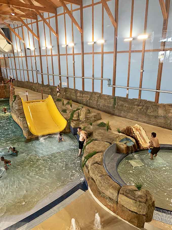 Nothing says "I'm living my best life" like shooting down a yellow water slide while it's potentially snowing outside.
