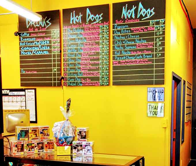 Menu: Decisions, decisions! The chalkboard menu reads like a delicious comic book &ndash; each hot dog a different character in this culinary universe.