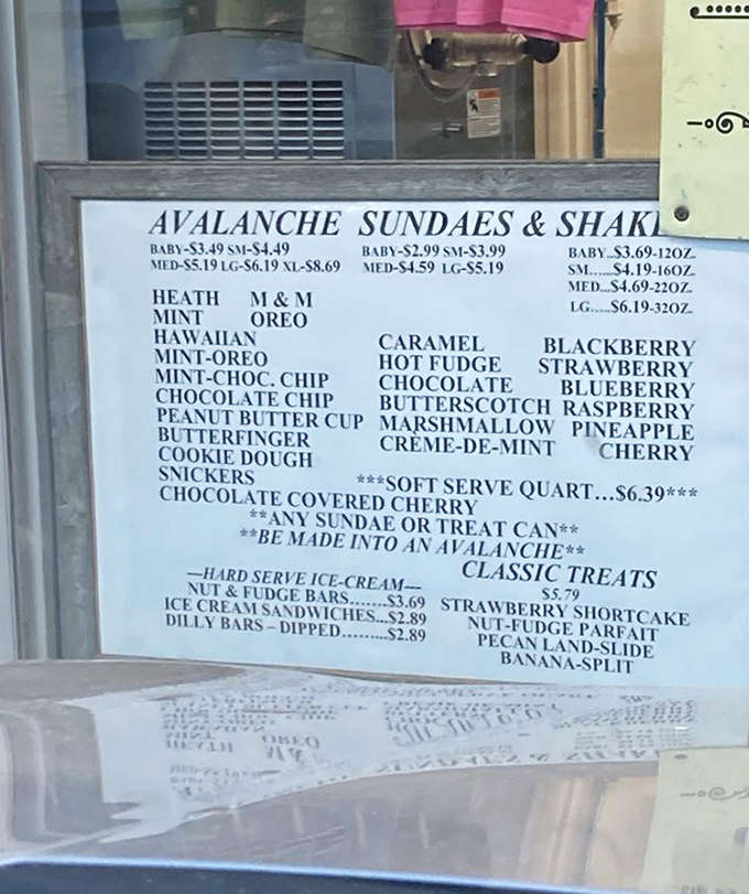 The menu board reads like a dessert lover's dream, with Avalanche sundaes offering everything from Heath bars to chocolate-covered cherries.