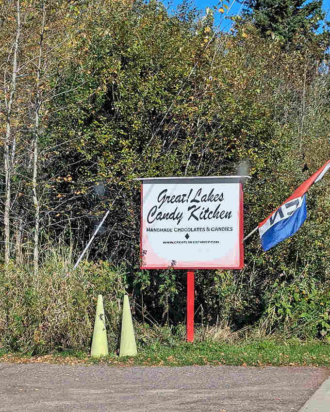 The roadside sign promises handmade chocolates and candies, a sweet beacon for travelers along Minnesota's scenic North Shore.