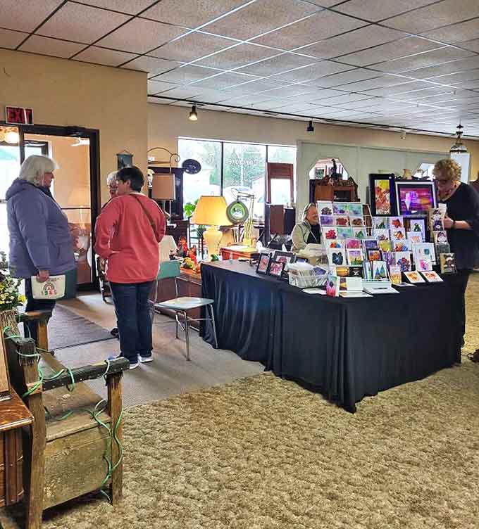 The golden hanging lamp creates a focal point among the organized chaos of treasures, showcasing the unique finds waiting at Net's Old Barn.